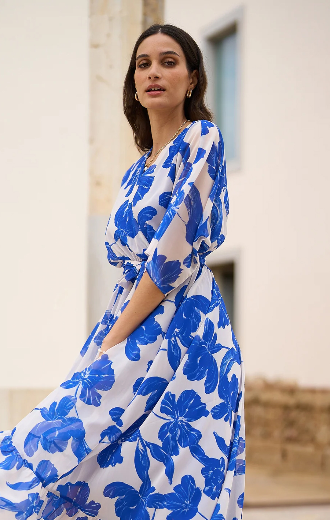 Yumi Black Blossom Print Wrap Midi With Dipped Hem | Yumi